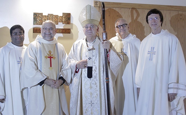 ADOM :: 'A priest is to build bridges and not walls'