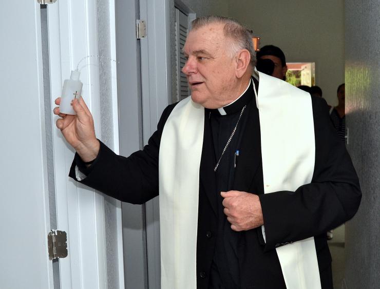 ADOM :: 'God's co-workers' house another family