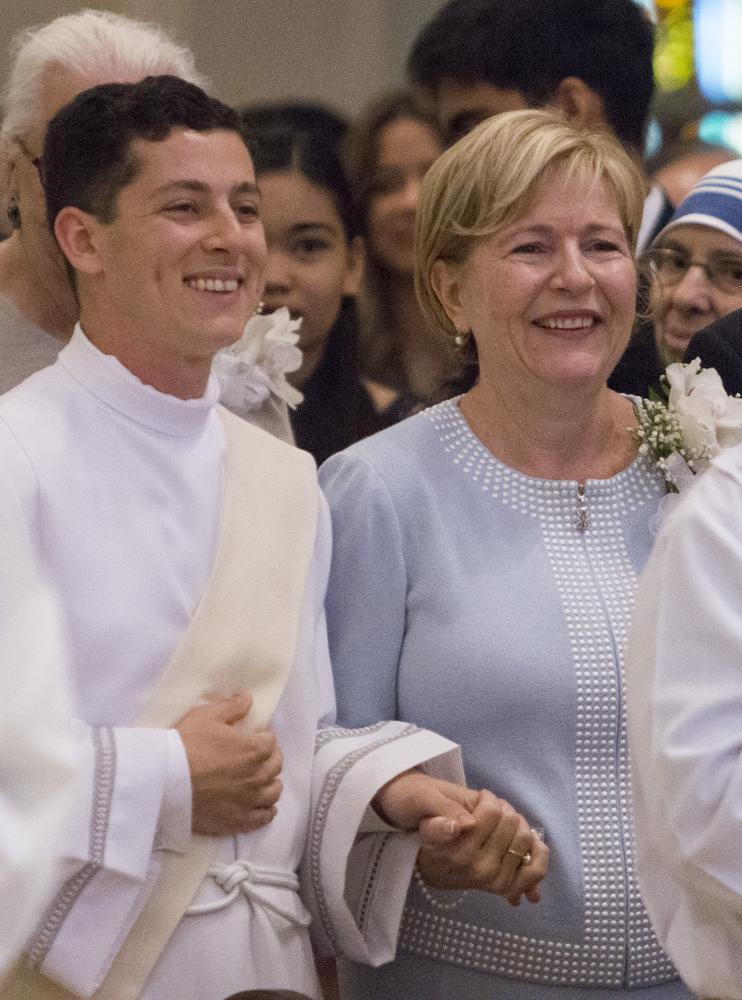 ADOM :: Archbishop ordains nine to priesthood