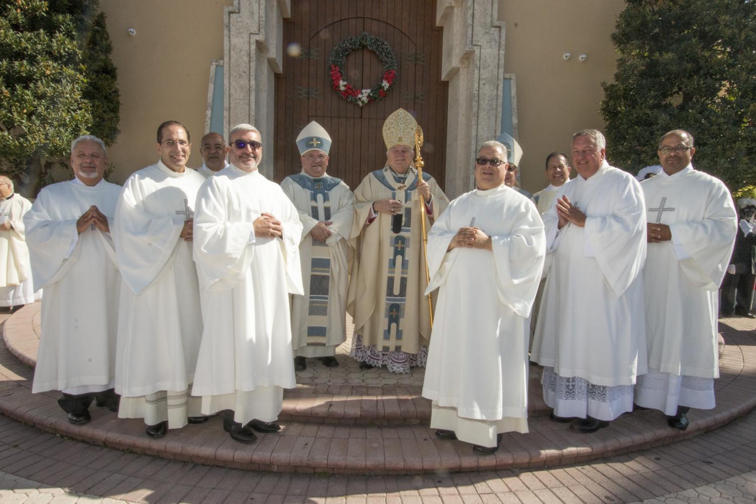 ADOM :: God of surprises leads six to permanent diaconate