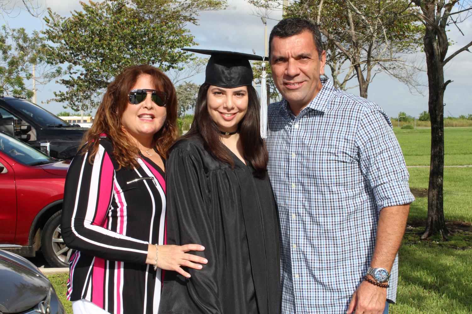 ADOM :: Caps, gowns, diplomas, and face masks