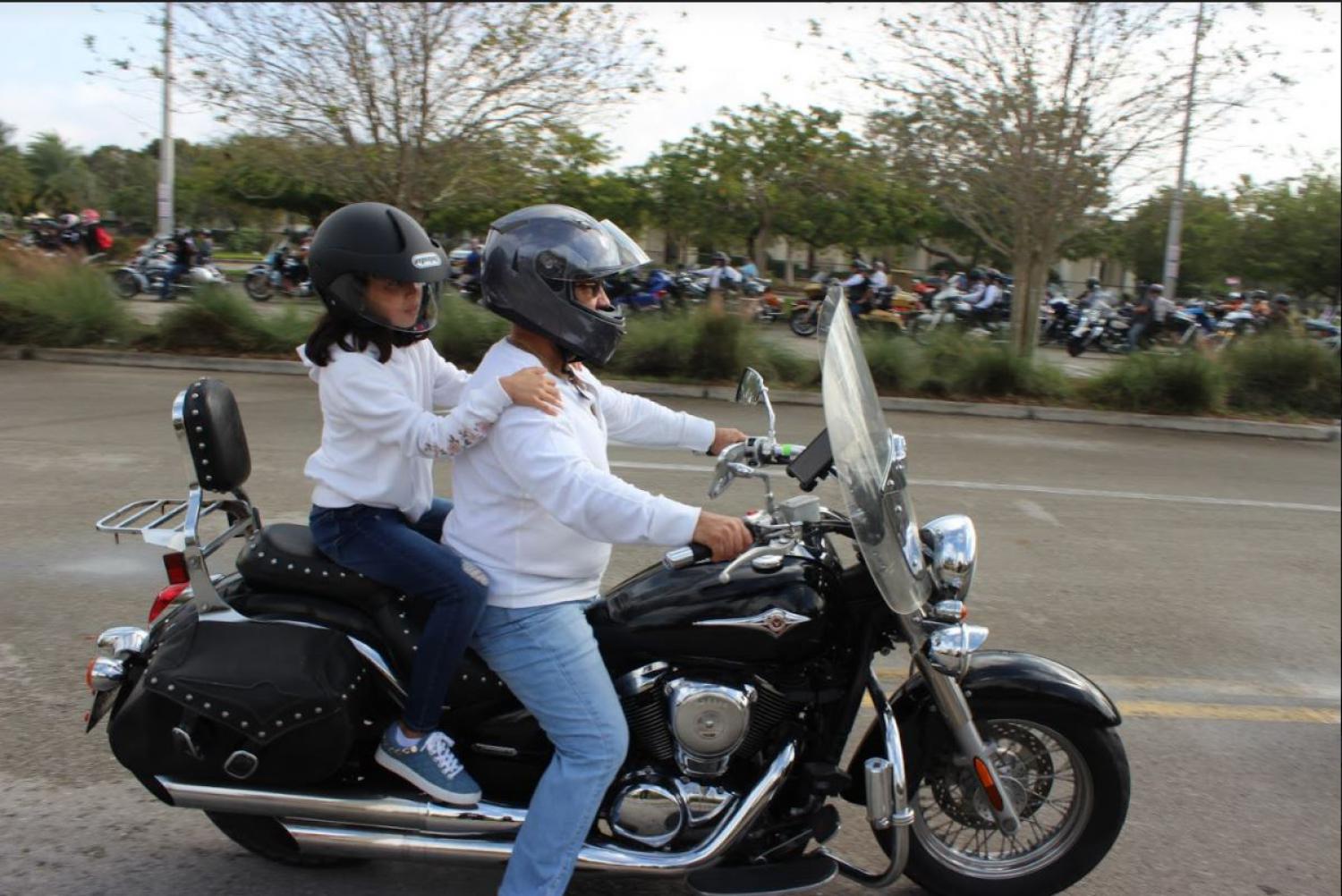 ADOM :: Nearly 250 join archbishop in motorcycle ride for St. Luke's