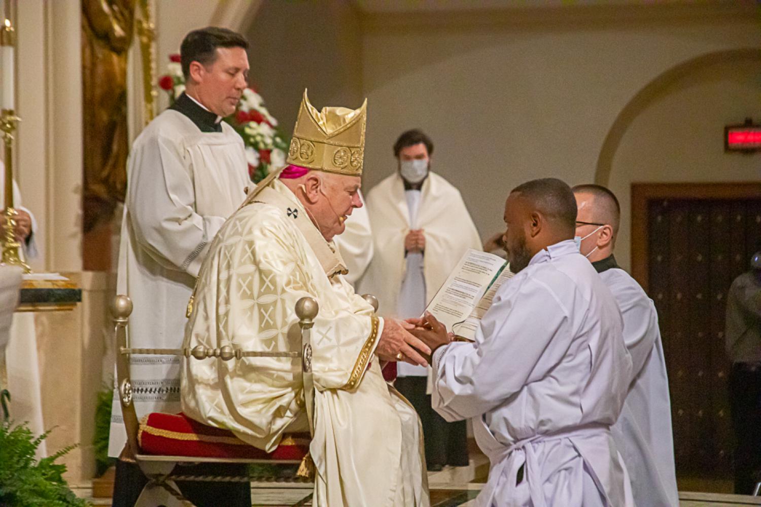 ADOM :: 3 Men ordained deacons
