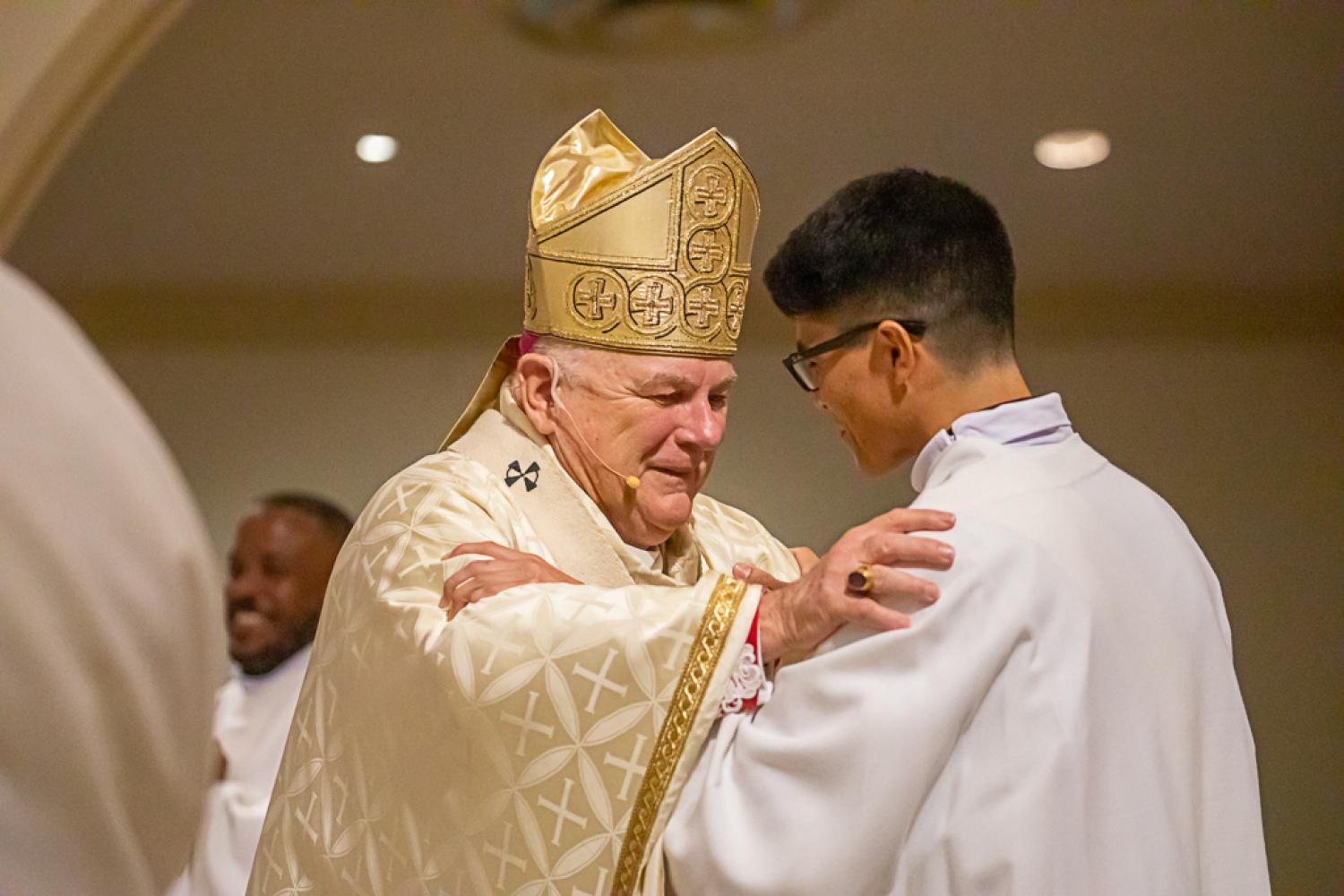 ADOM :: 3 Men ordained deacons