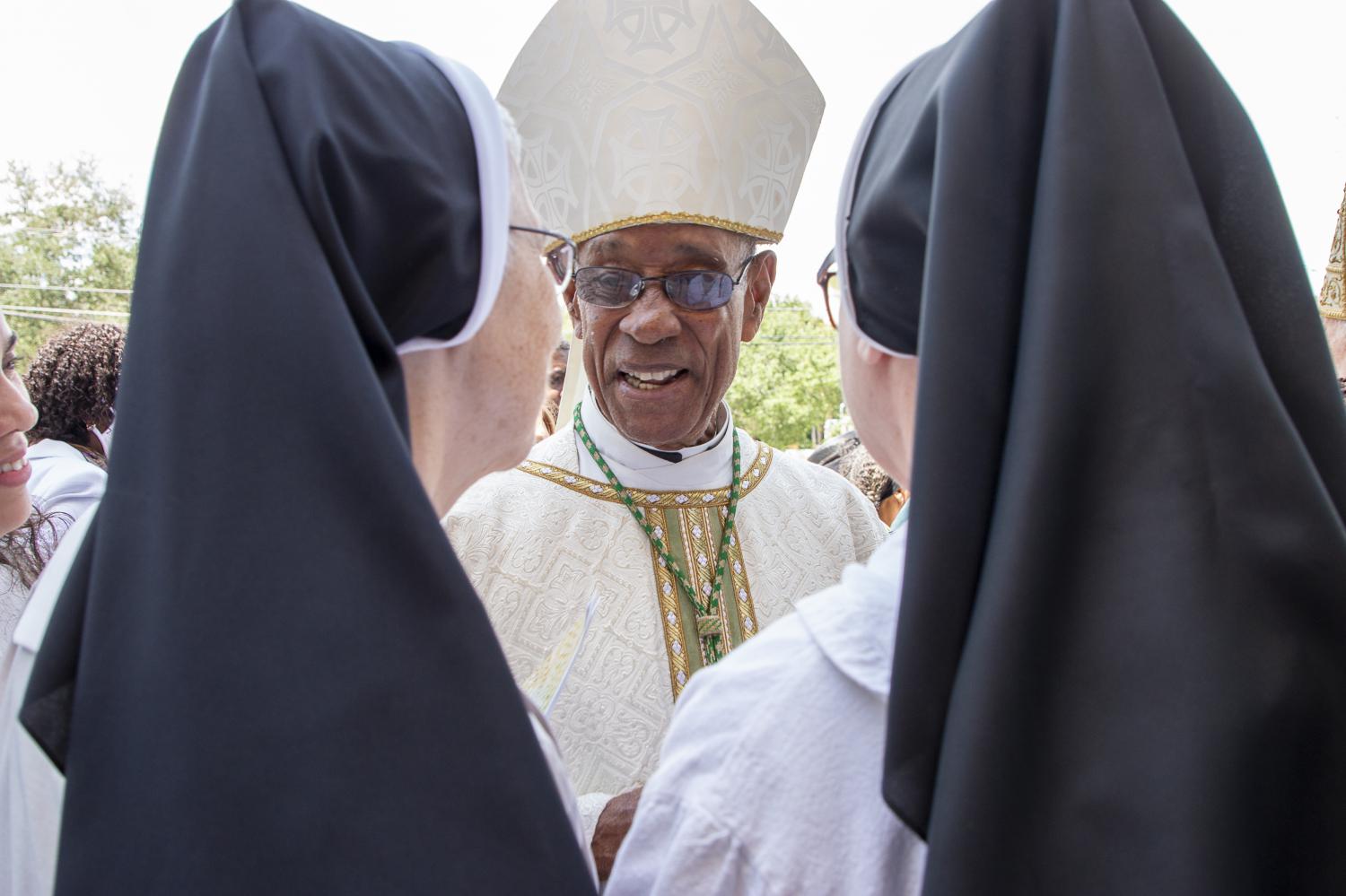 ADOM :: 15 priests honored at chrism Mass