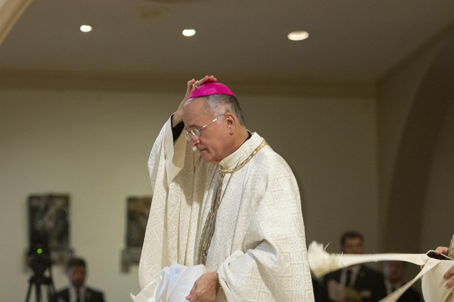 ADOM :: 15 priests honored at chrism Mass