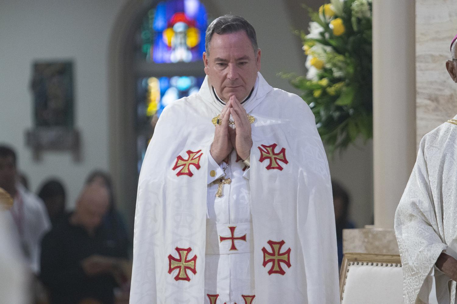 ADOM :: 15 priests honored at chrism Mass